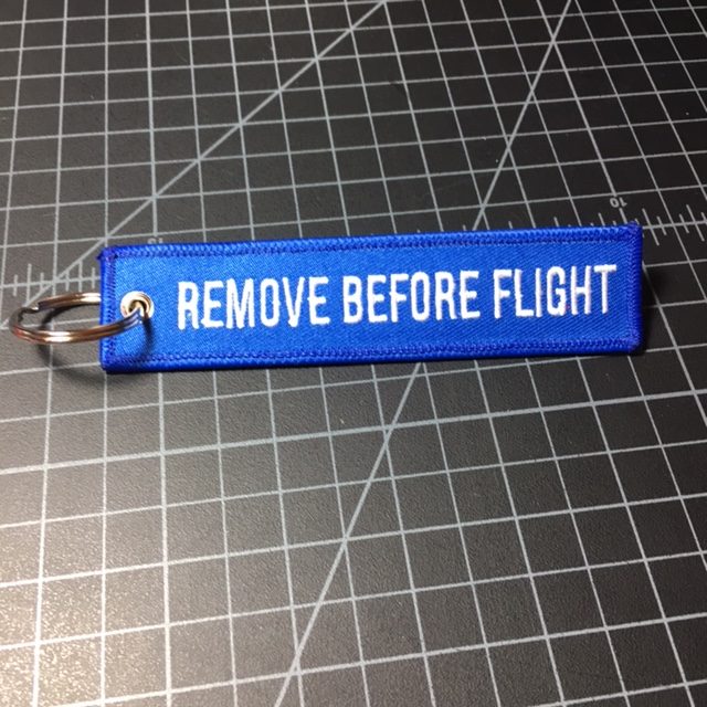 REMOVE BEFORE FLIGHT – Blue Keychain – Sticker Boost